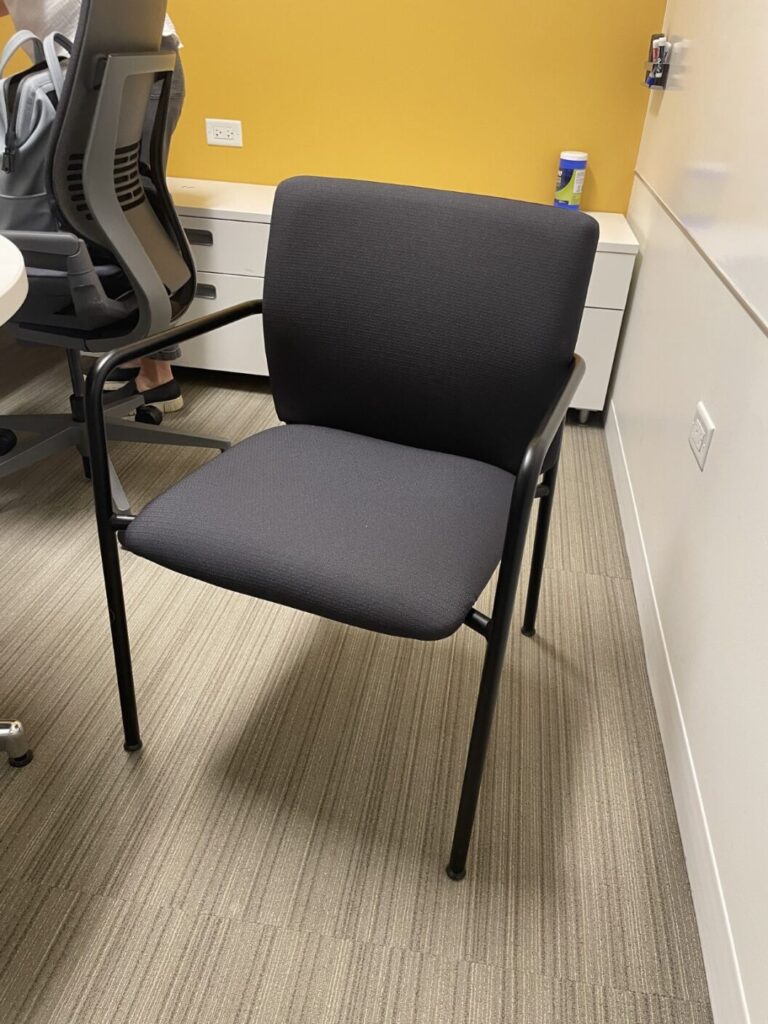 Used Turnstone Fabric Stack Chair in Black - Office Furniture Resources